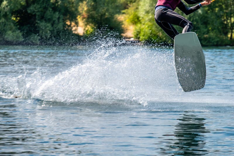 Boy Having Fun with Waterski on the Lake Stock Image - Image of jump ...