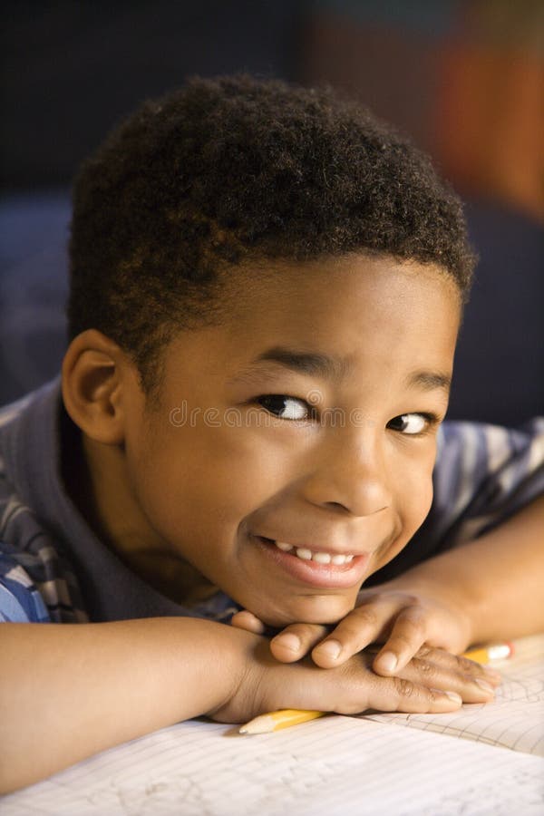 Boy with Head on Hands with Book. Stock Photo - Image of head, viewer ...