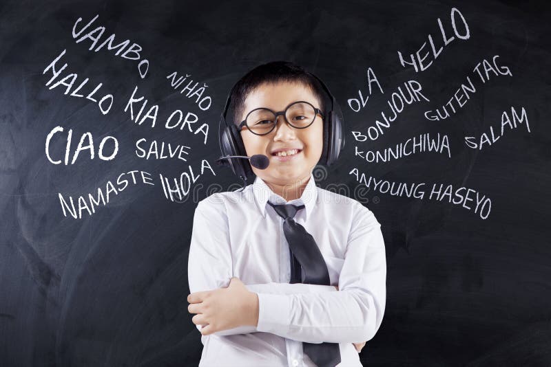 Boy with Headphones Learns Multilingual Stock Photo - Image of ...