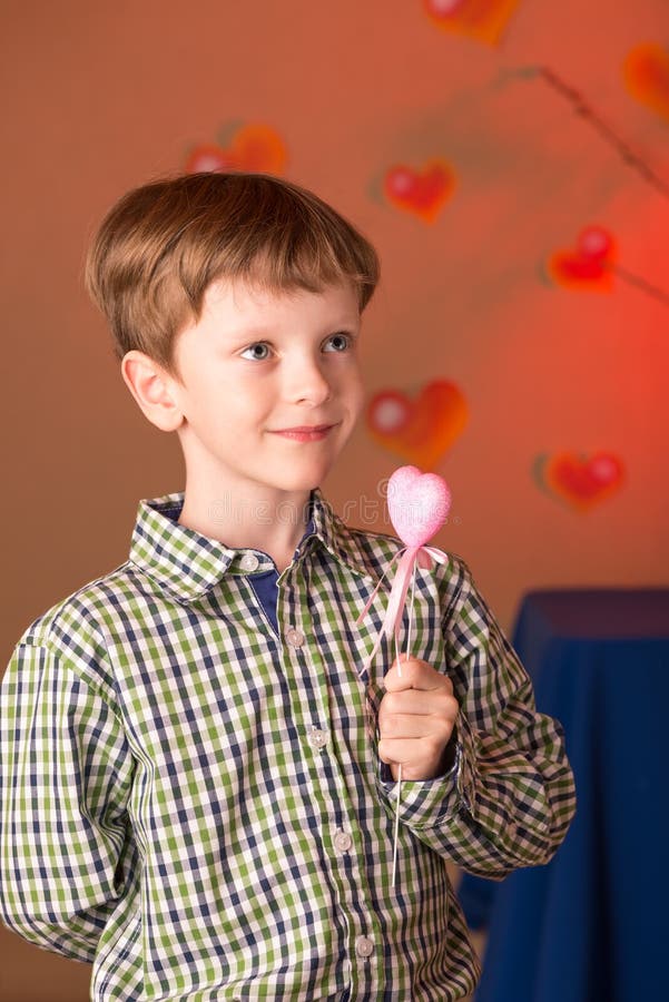 Boy with a Heart in His Hands Stock Image - Image of gift, rose: 74575265