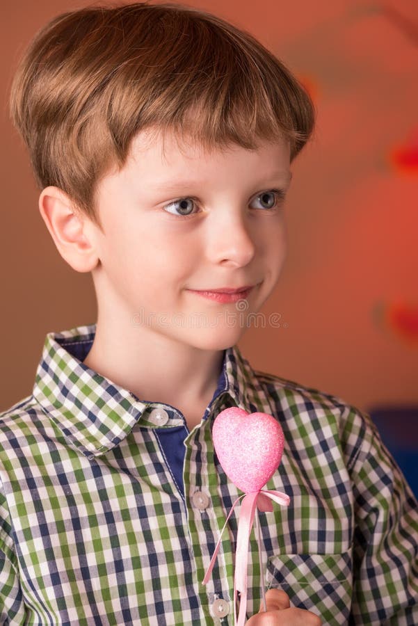 Boy with a Heart in His Hands Stock Photo - Image of pink, positivity ...