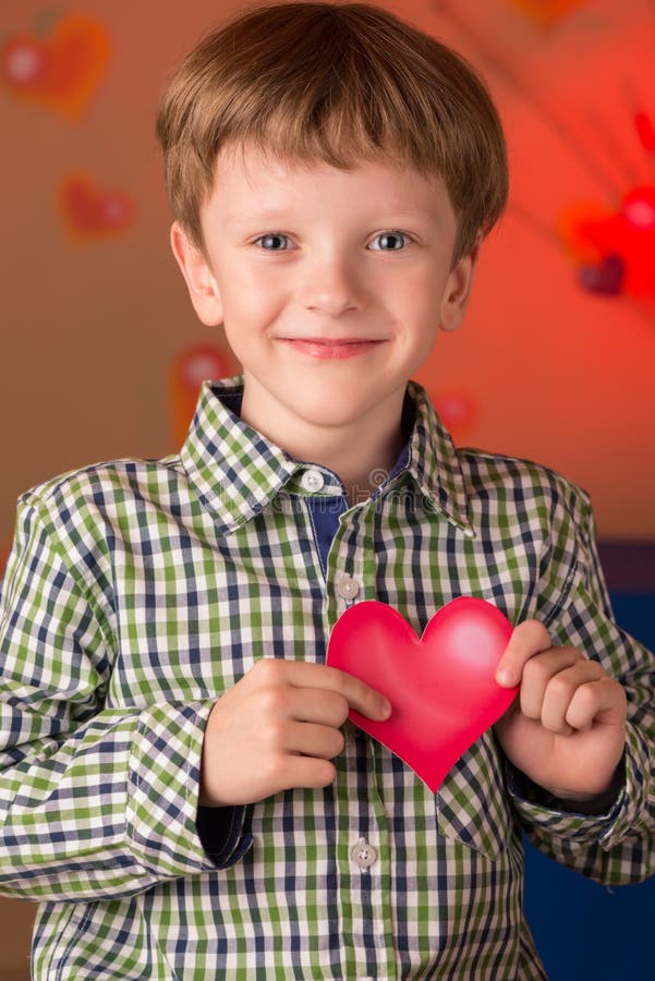 Boy with a Heart in His Hands Stock Photo - Image of affectionate ...