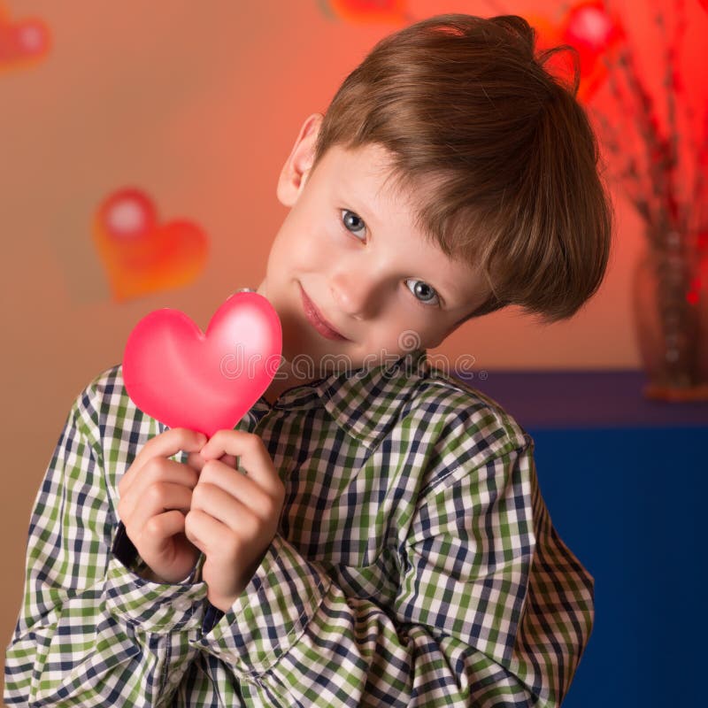 Boy with a Heart in His Hands Stock Image - Image of holiday, male ...