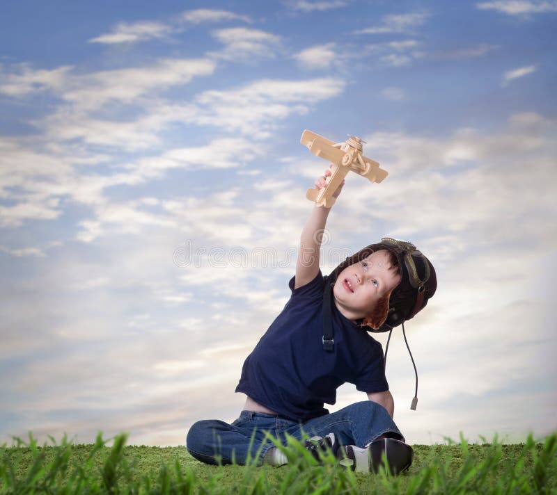 Boy in Helmet Pilot Playing with a Airplane Stock Image - Image of ...