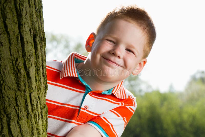 274 Boy Hiding Behind Tree Stock Photos - Free & Royalty-Free Stock ...