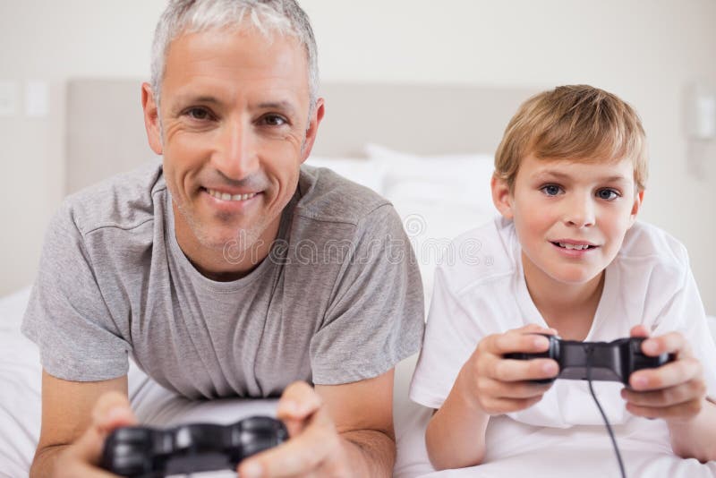 Brothers Playing Video Games Boredom Stock Photo - Image of arcade ...