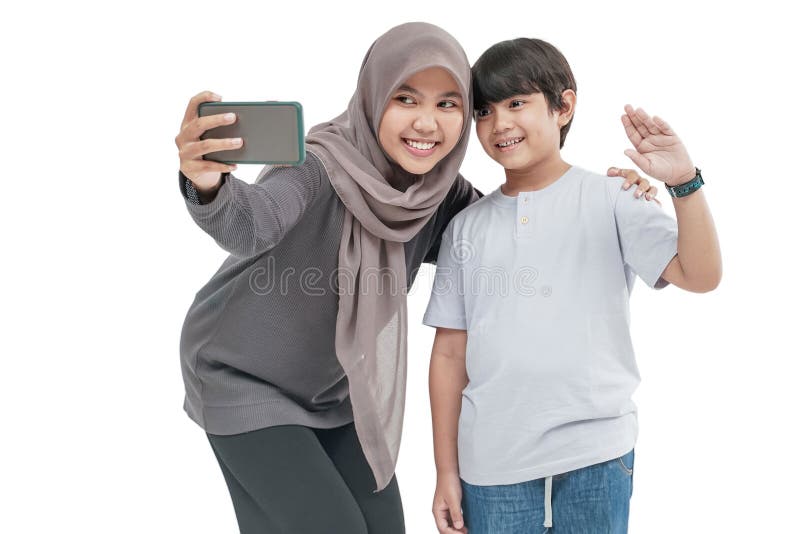 Boy and His Mother Make a Video Call Using Phone Camera Stock Photo ...
