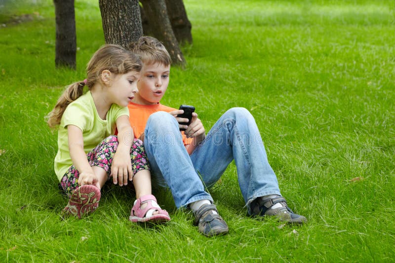 Boy and His Sister Sit and Play Electronic Game Stock Image - Image of ...