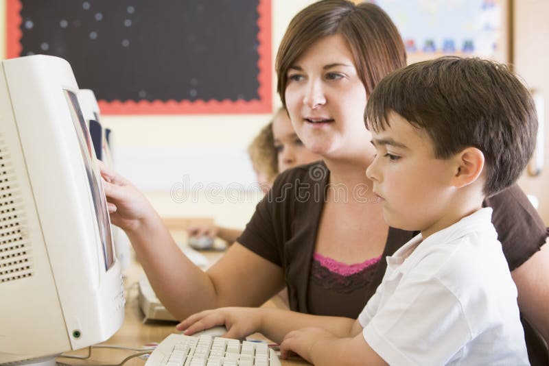 Girl Working on a Computer at Primary School Stock Image - Image of ...
