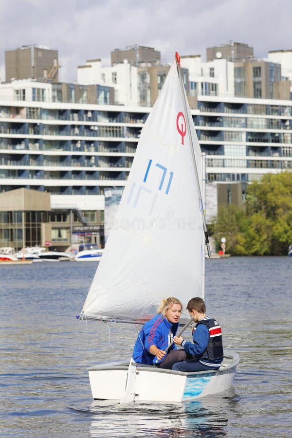 Boy and His Trainer Sail on Small Yacht in Yacht Stock Image - Image of ...