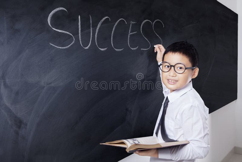 Boy Holding Book and Write Success Word Stock Photo - Image of ...