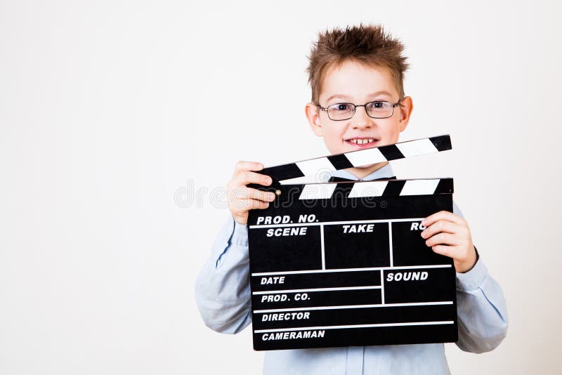 Boy holding clapper board stock photo. Image of copy - 36368018