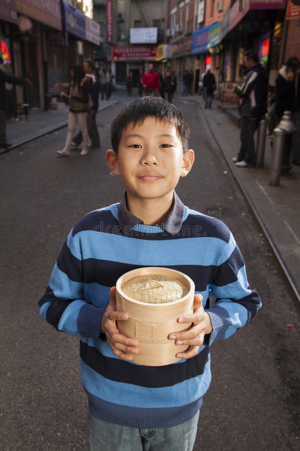 Boy holding dumplings stock photo. Image of asian, york - 73166436