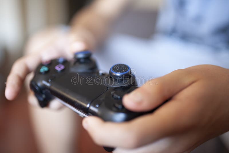Boy Holding Game Controller Stock Photo - Image of controller, hobby ...