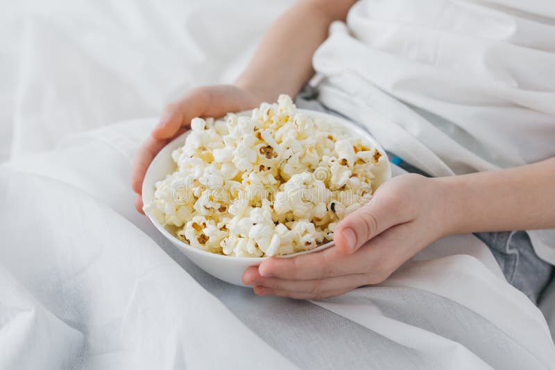 Boy is Holding a Handful of Popcorn Close-up Stock Photo - Image of ...