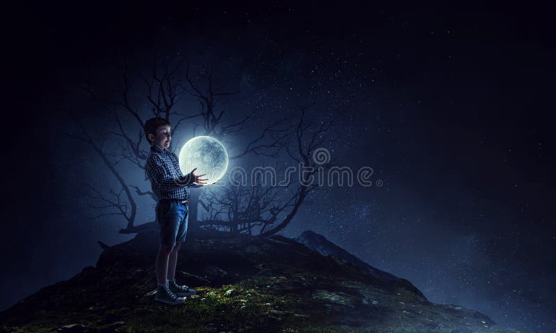 Boy holding moon at night stock image. Image of nature - 198036857
