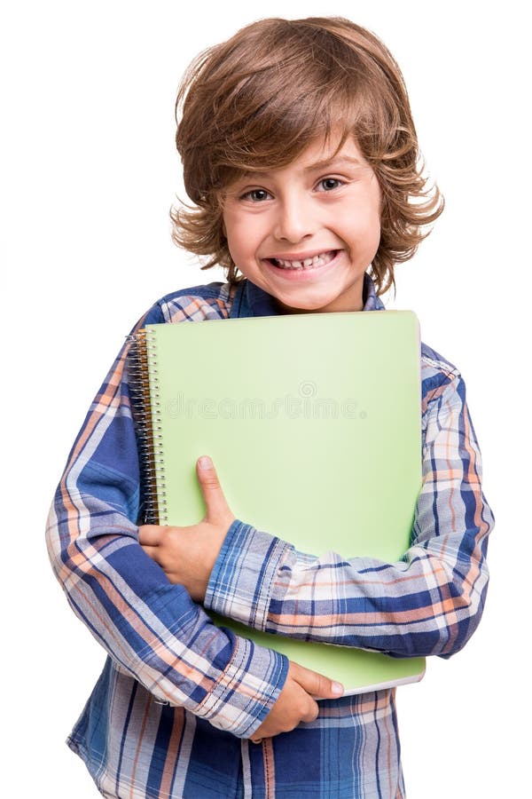 Boy holding school books stock photo. Image of little - 42956856
