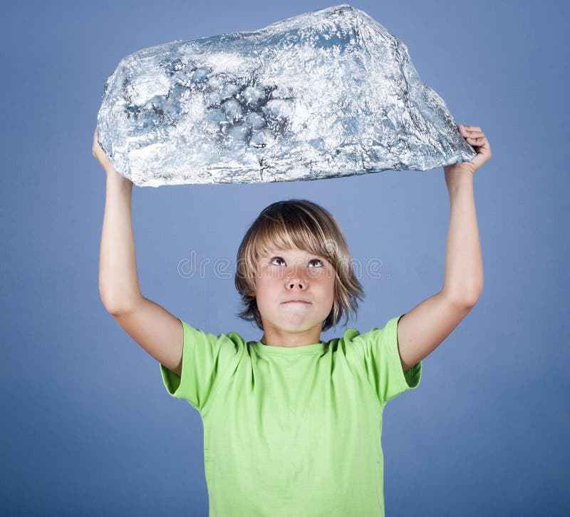 Boy holding a stone stock photo. Image of person, stone - 33005322