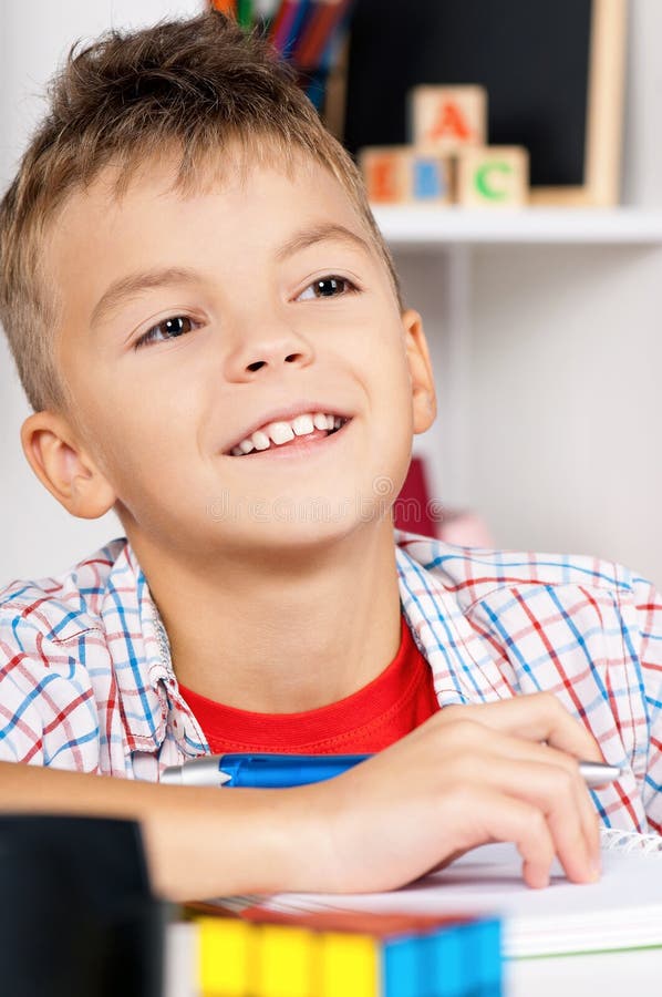 Boy homework at table stock image. Image of high, child - 75417233
