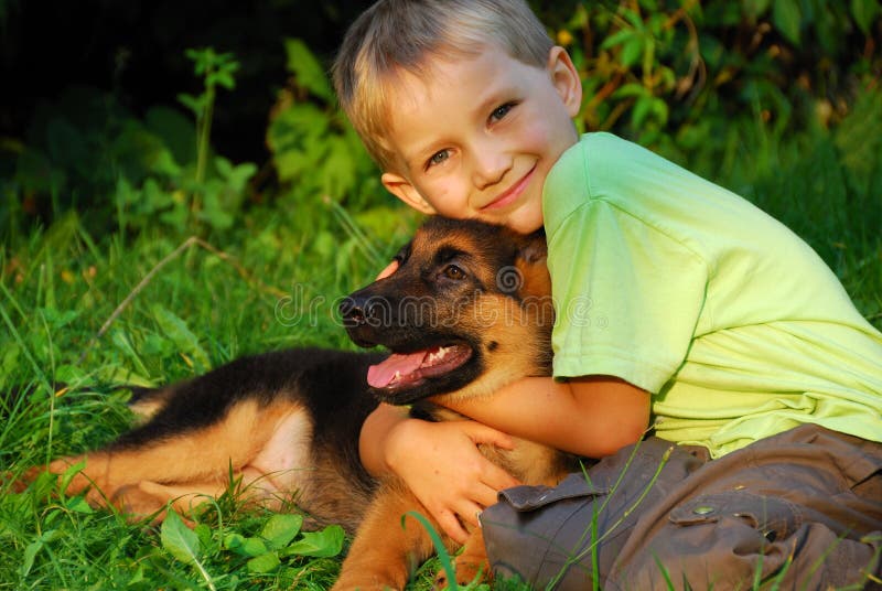 Boy hugging his dog stock photo. Image of child, outside - 3259762