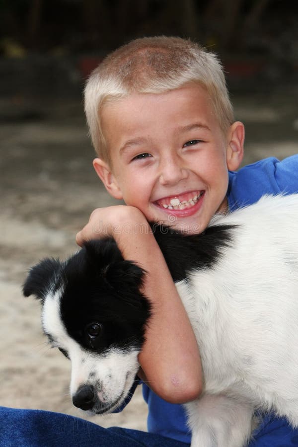 Boy Hugging His Dog stock photo. Image of outdoor, animals - 9608794