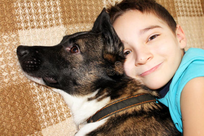 The Boy Hugs His Dog. Friendship. Stock Photo - Image of home, cheerful ...