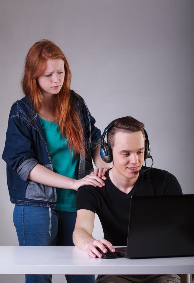 Boy Ignoring Girlfriend while Playing Computer Games Stock Image ...