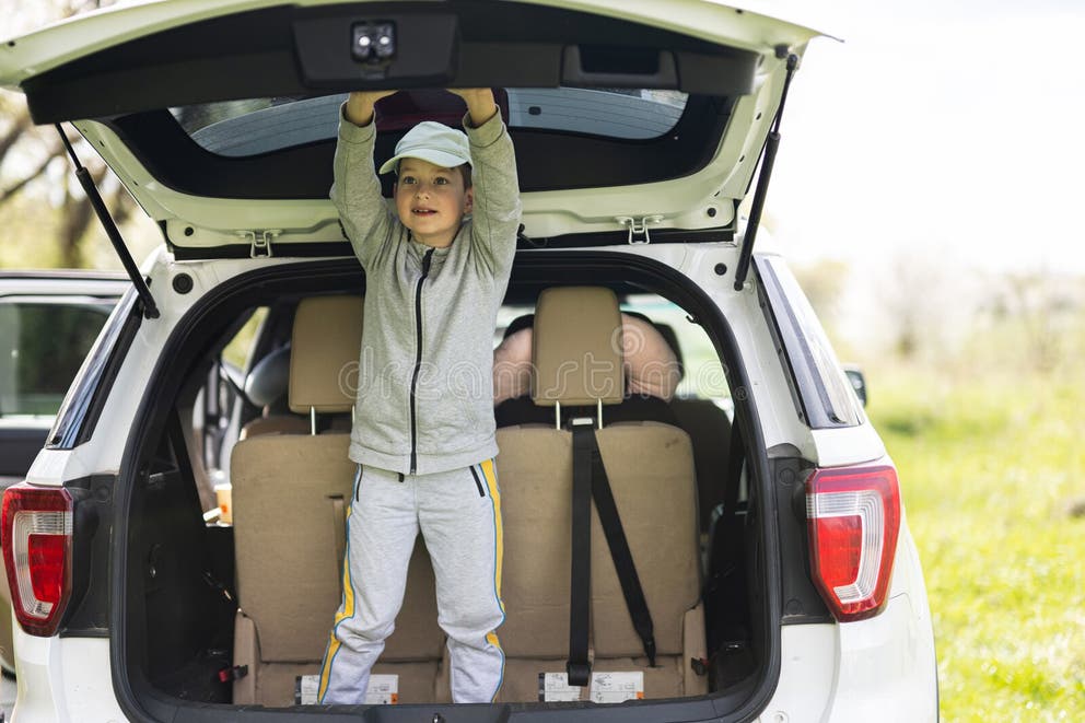 Boy Inside Car Open Trunk at Picnic Stock Photo - Image of trunk ...