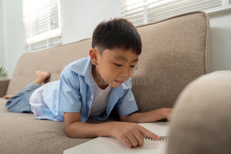 Back To School and Focused Learning. a Boy Deeply Focused on His ...