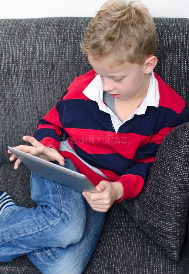 Boy on ipad stock photo. Image of game, read, math, samsung - 34860138