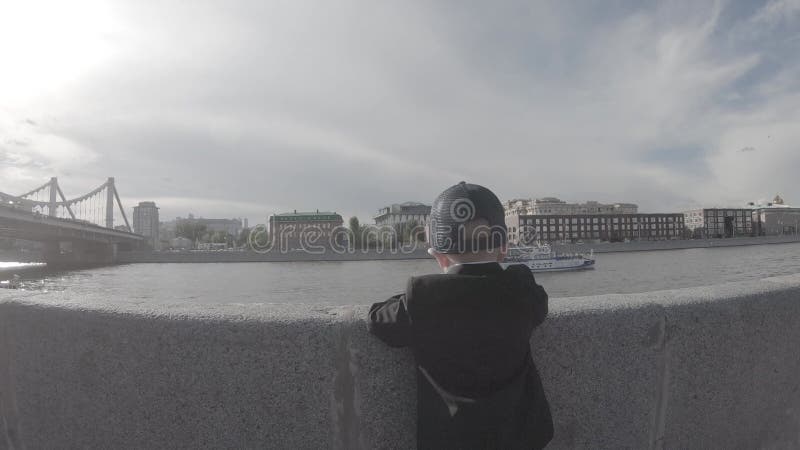 Boy in a Jacket and a Baseball Cap Stock Video - Video of leisure ...