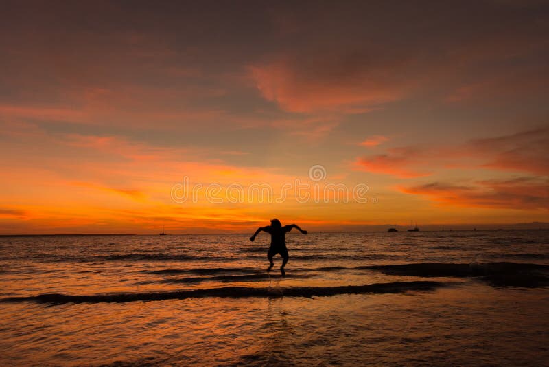 Boy jump out of the water stock image. Image of moment - 104498751
