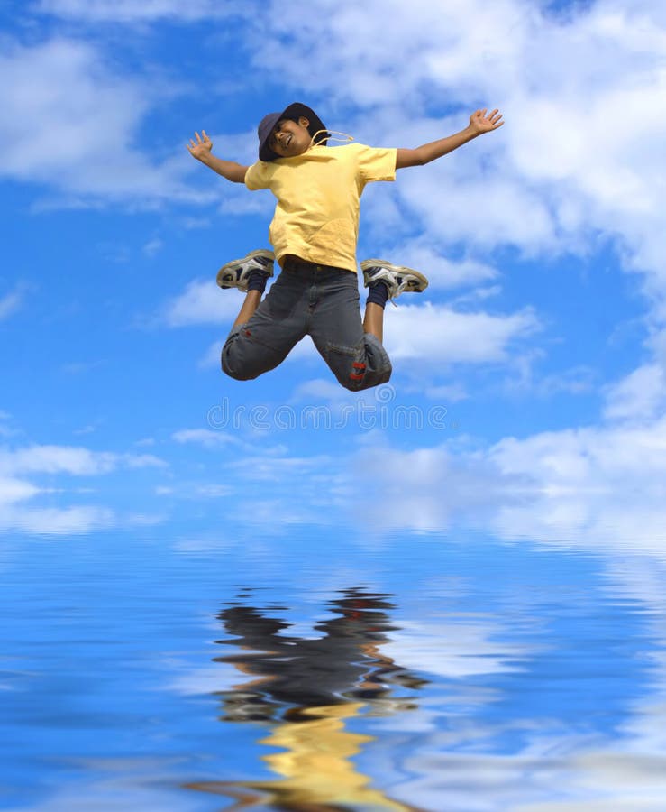 Boy jumping stock photo. Image of cheeky, playing, happiness - 5293444