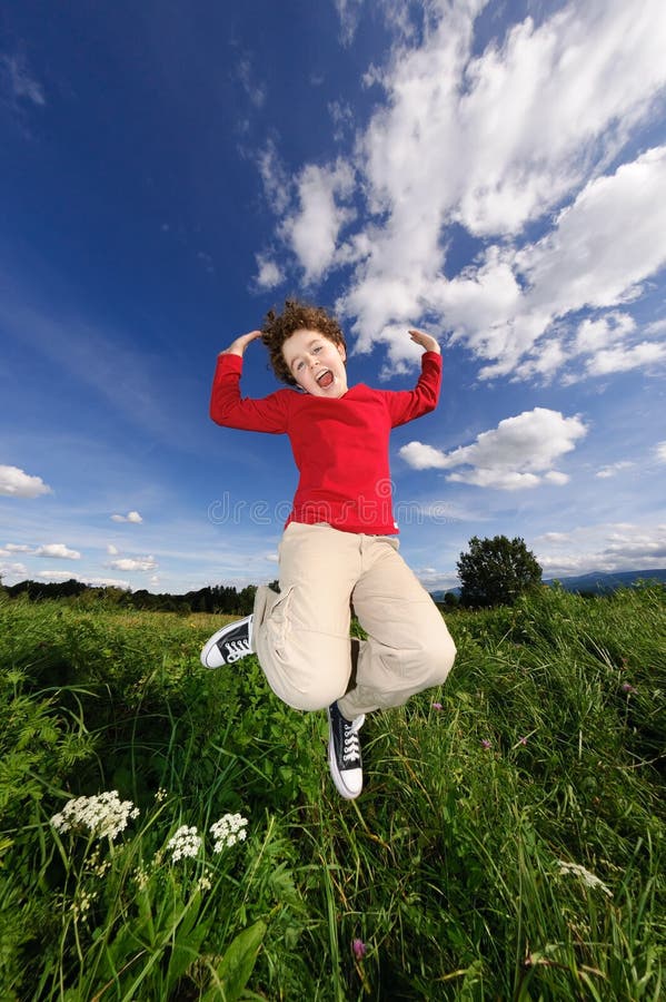 Boy jumping outdoor stock image. Image of enjoy, active - 16189681