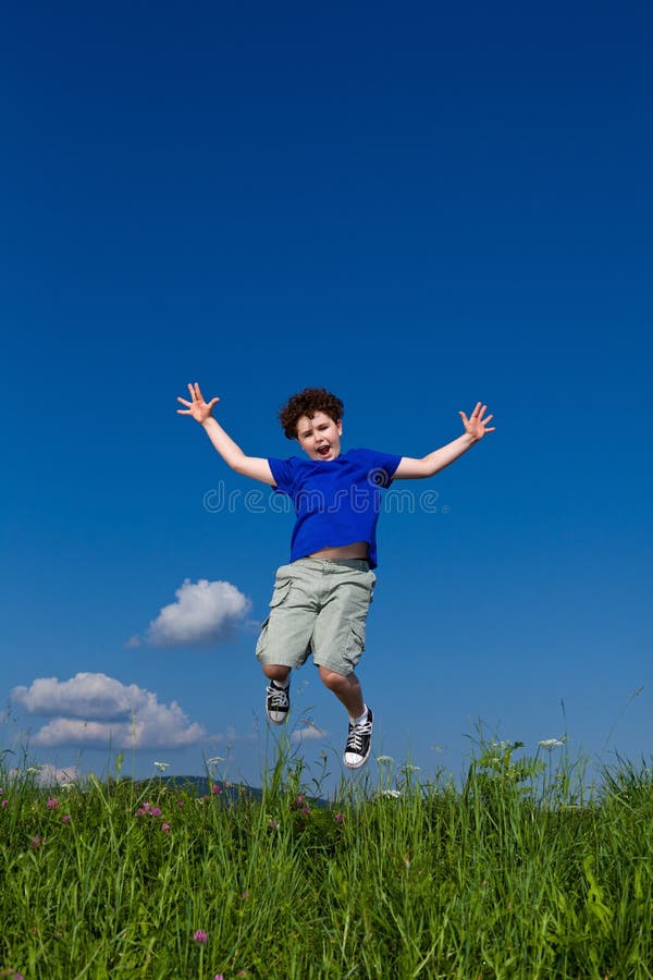 Boy jumping outdoor stock image. Image of childhood, leap - 19582389