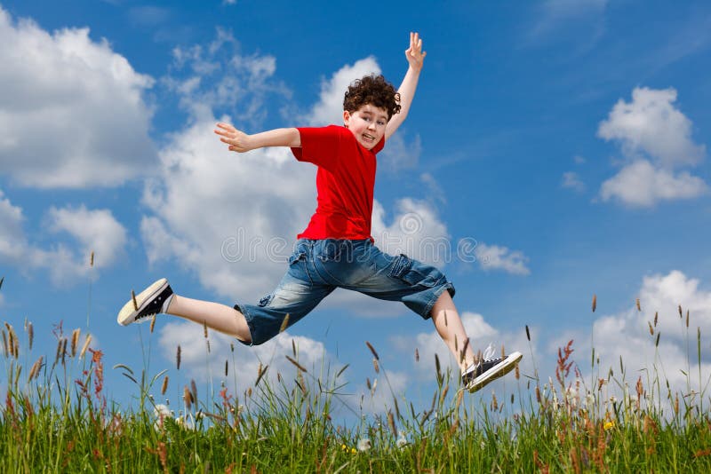 Boy jumping outdoor stock photo. Image of adolescent - 54500138