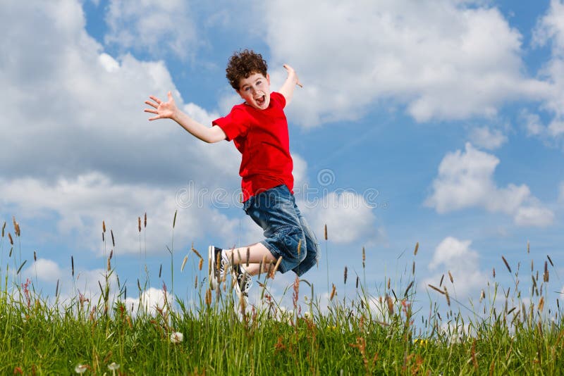 Boy jumping outdoor stock photo. Image of lifestyle, horizontal - 54500194