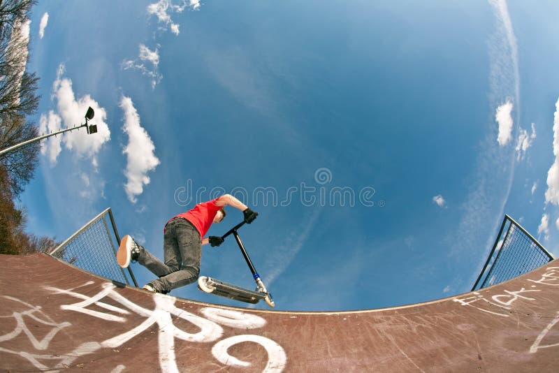 Boy Jumping with a Scooter Over a Pipe Stock Image - Image of child ...
