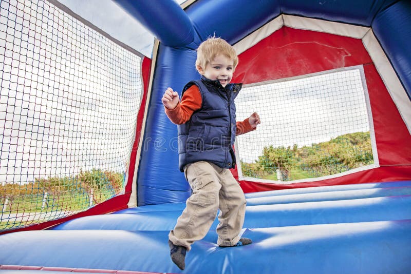 Inflatable Bounce House Water Slide in the Backyard Stock Image - Image ...