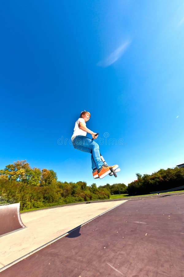Boy Jumps with His Trick Scooter Stock Image - Image of feeling, jump ...