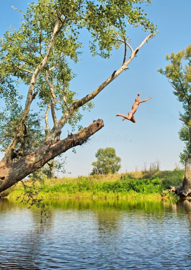 Boy Jumps in Water from Tree Stock Photo - Image of russian, leap: 30074416