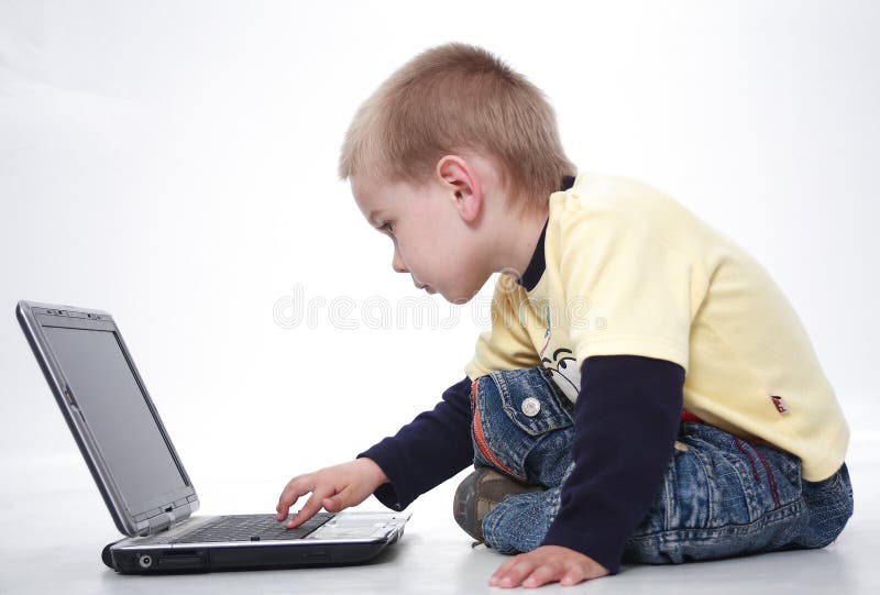 The Boy Is Keen On The Laptop Stock Photo - Image of modern, works: 5581014
