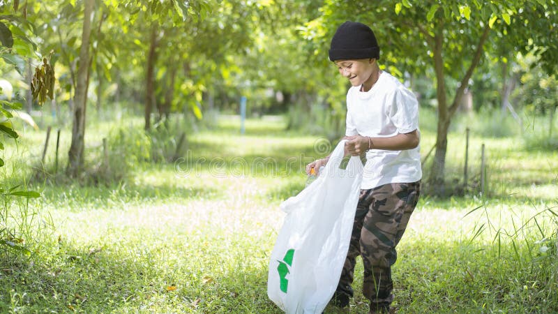 Boy Keep the Plastic Bottle in the Garbage Bag Stock Image - Image of ...