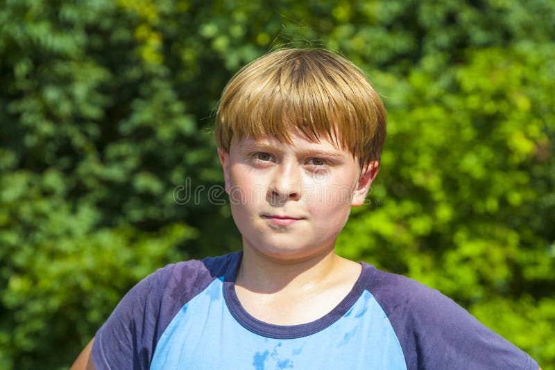 Boy keeps a straight face stock image. Image of eyes - 37277231