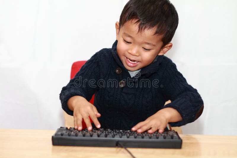 Boy and keyboard stock photo. Image of four, toddler - 49069774