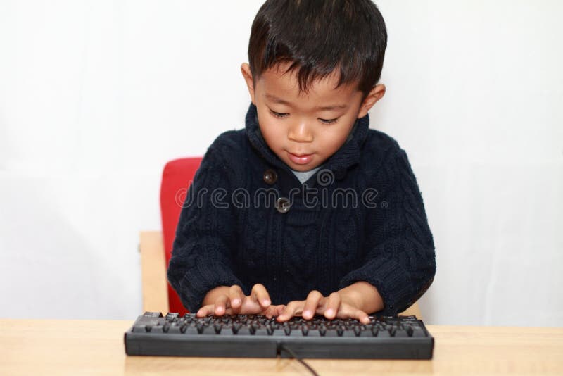 Boy and keyboard stock photo. Image of four, toddler - 49069774