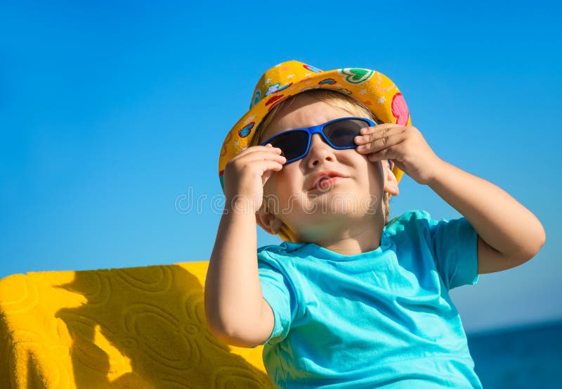 Boy Kid in Sun Glasses and Hat on Beach Stock Photo - Image of resort ...