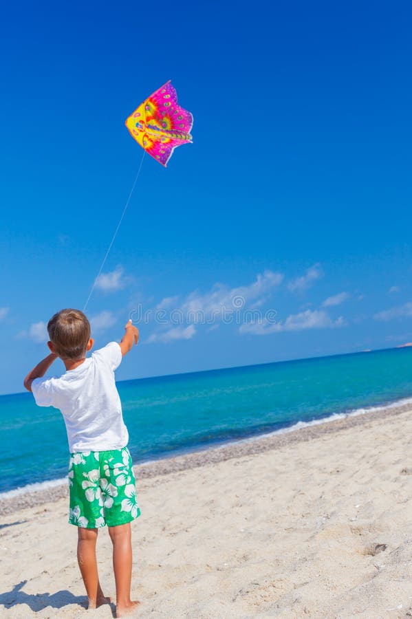 Boy with kite stock photo. Image of outdoor, aerial, boyl - 51467736