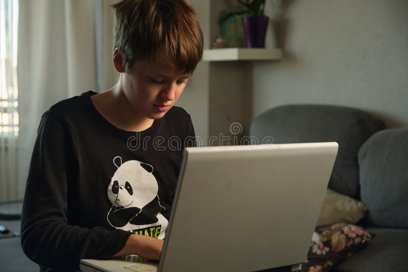 A Boy with a Laptop Computer Stock Photo - Image of portrait, screen ...