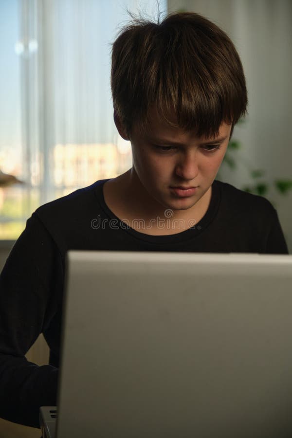 A Boy with a Laptop Computer Stock Photo - Image of student, browsing ...